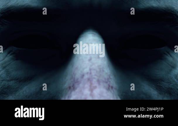 Scary menacing gaze of a man with empty black eyes close-up. Horror ...