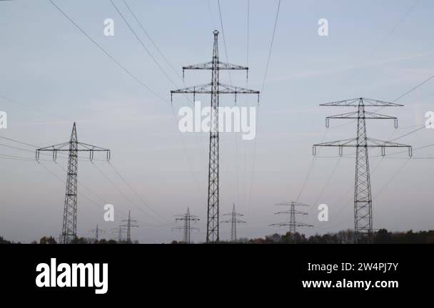 Large transmission towers in the countryside. Different types of ...
