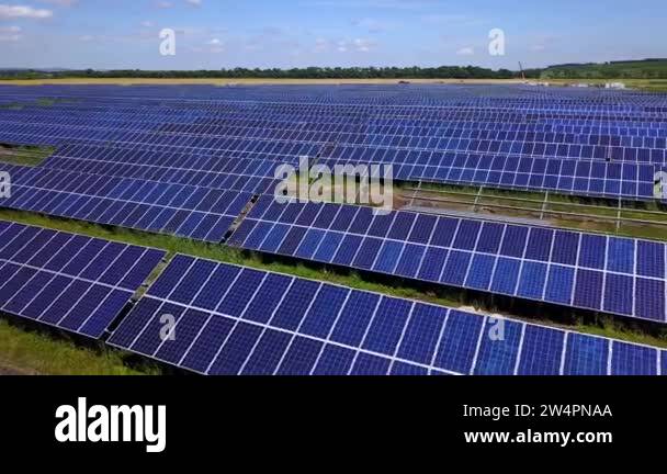 Solar panel farm generating electricity for national grid with a motion ...