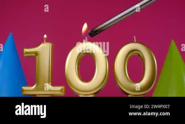 Burning birthday cake candle number 100. Happy Birthday background ...