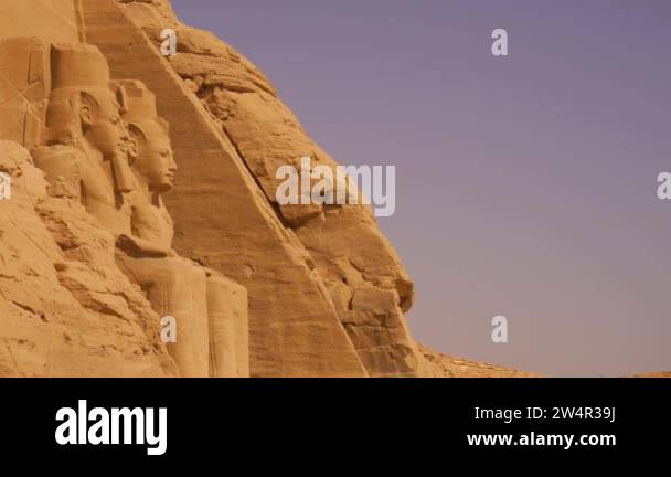 Traveling video of the pharaohs of the temple of Abu Simbel carved into ...