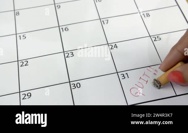 Quit Smoking - destroying a cigarette on a date calendar for no smoking ...