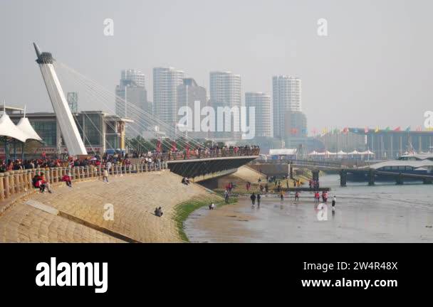 Crowded pedestrian bridge at Qingdao city, China Stock Video Footage ...
