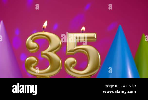Burning birthday cake candle number 35. Happy Birthday background ...
