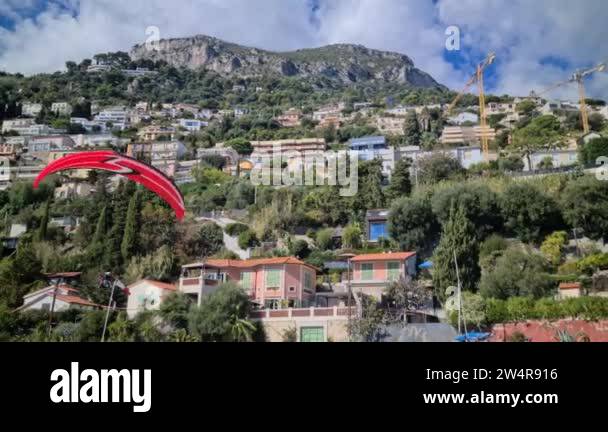 Roquebrune-Cap-Martin, France - October 21, 2020: 8K Tandem Paragliding ...