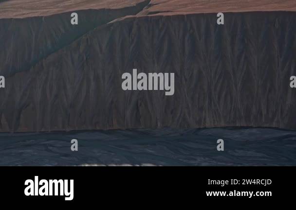 A panning shot showing spiti river with beautiful natural pattern ...