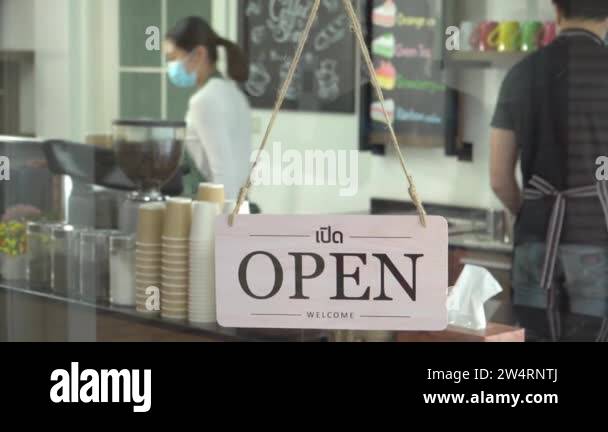 reopen the coffee shop after the quarantine. young man who owner a ...