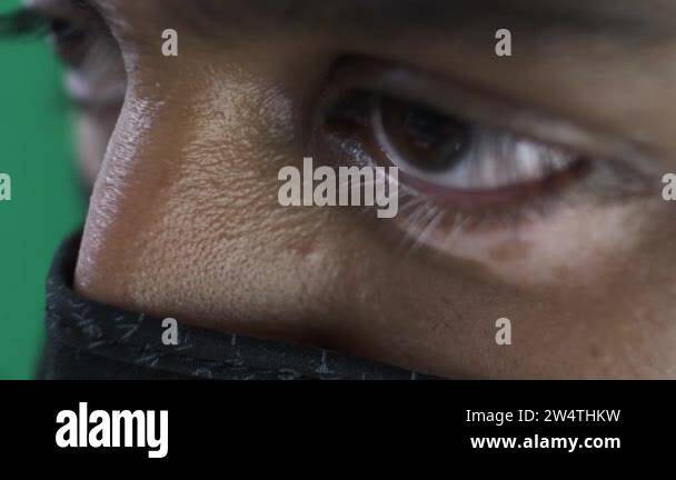 Blinking Asian Male Eye Close Up Wearing Face Mask. Macro, Green Screen ...