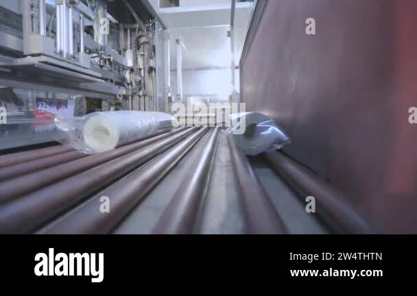 Automated wallpaper production line. Wallpaper production process in a ...