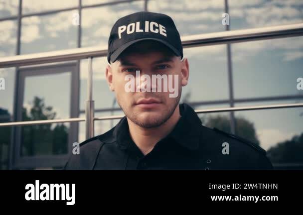 Policeman looking at camera Stock Videos & Footage - HD and 4K Video ...