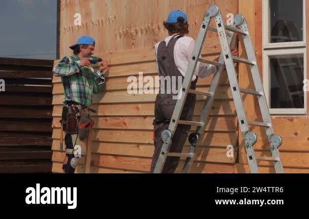Installing siding Stock Videos & Footage - HD and 4K Video Clips - Alamy