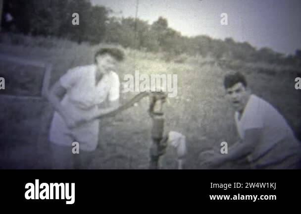 Man and woman at well Stock Videos & Footage - HD and 4K Video Clips ...