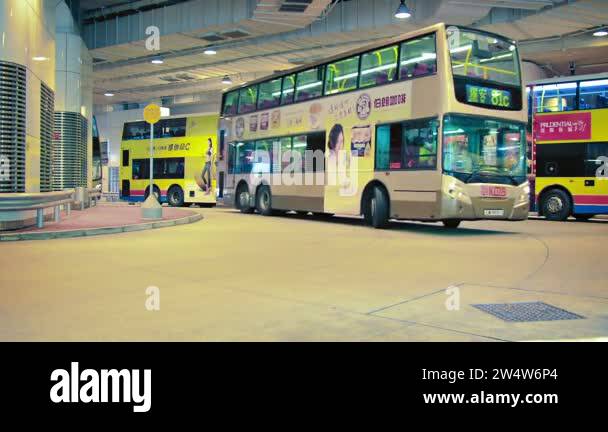 Double decker buses moving into staging position to load passengers at ...