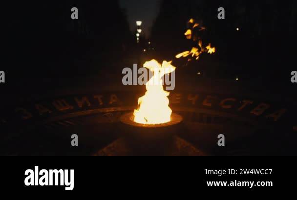 Titles protect the tation. Fire, flames in the dark, you can see the ...