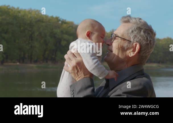 Funny Game and Laugh of Caucasian Old Man and Baby Girl in Domestic ...
