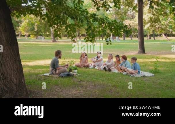 Kids studying under tree Stock Videos & Footage - HD and 4K Video Clips ...