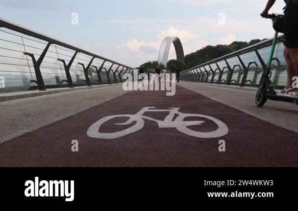 Girl rides an eco-friendly electric scooter sign, bottom and back view ...