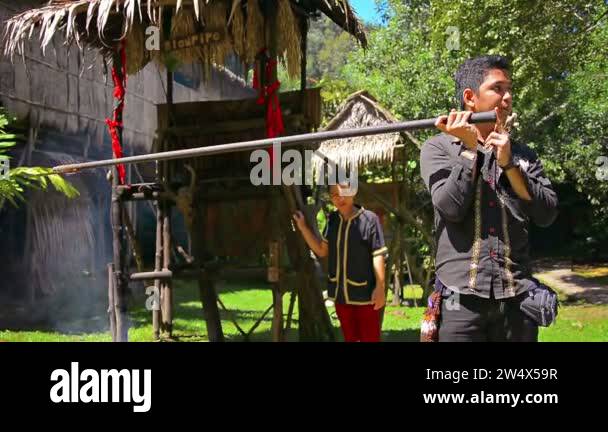 Professional tour guide demonstrates and explains the use of a ...