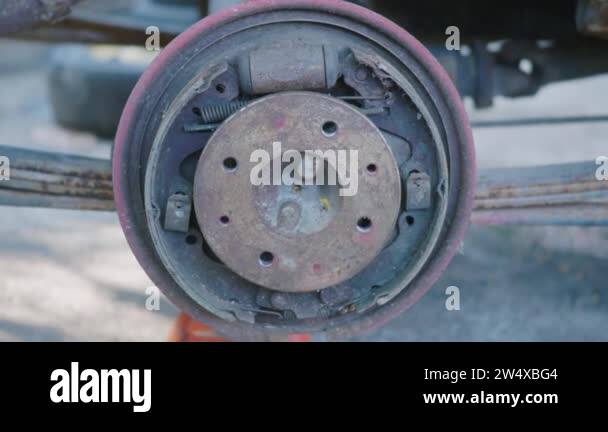 Rusted hulk wreck of drum brake mechanism partially, old metal ...