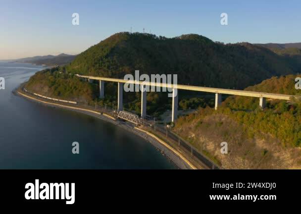large bridge for motorway across sea, aerial view of drone slide turn ...