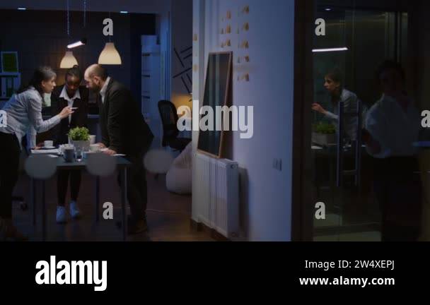 Focused leader woman enter in office meeting room lean on conference ...