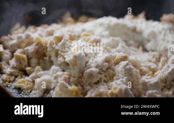 Preparation of traditional bechamel for homemade meat croquettes: milk ...