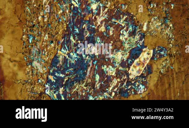 Granite stone cut under the microscope in polarized light Stock Video ...