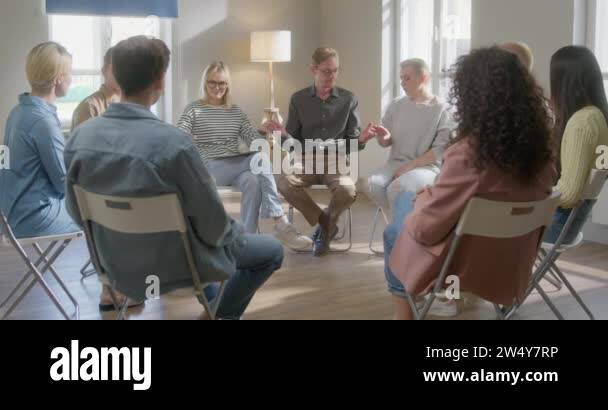 Close Up Young People Holding Hands Together During Group Therapy ...