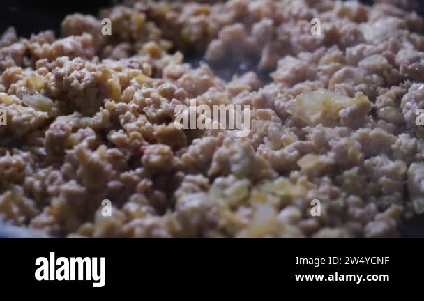 Preparation of traditional bechamel for homemade meat croquettes: milk ...