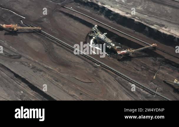 Rotation around of a mining quarry of coal or natural raw material ...