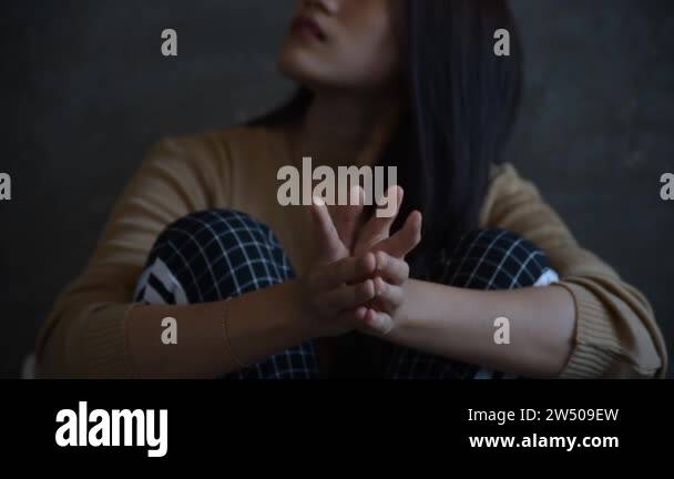 Slow footage of stressed woman raising hand touch her head, with tried ...