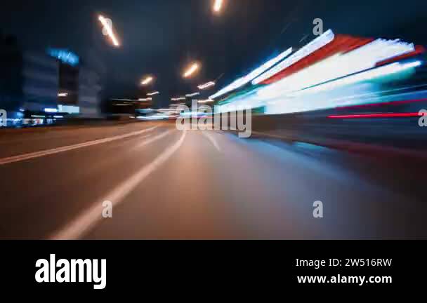 Beautiful motion timelapse of high speed drive on the night. Front view ...