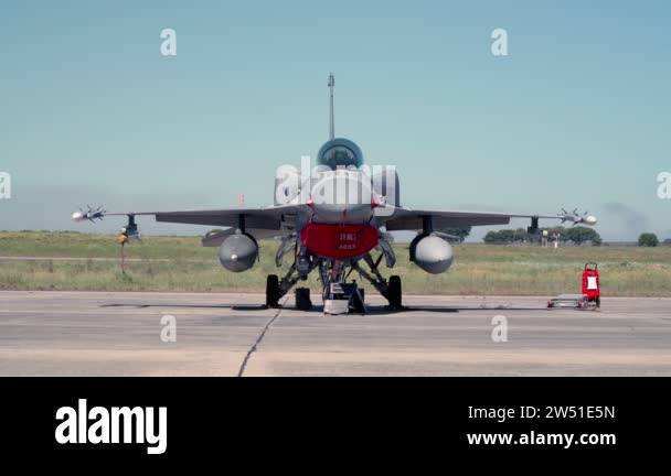 Jet military, airplane, fighter. Ribbons move in the wind, ready for ...