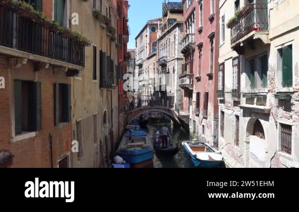 Congested gondola traffic on the streets of Venice. The water filled ...