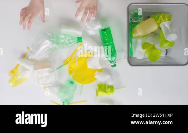 Conceptual from above flat lay footage of throwing used crumpled ...