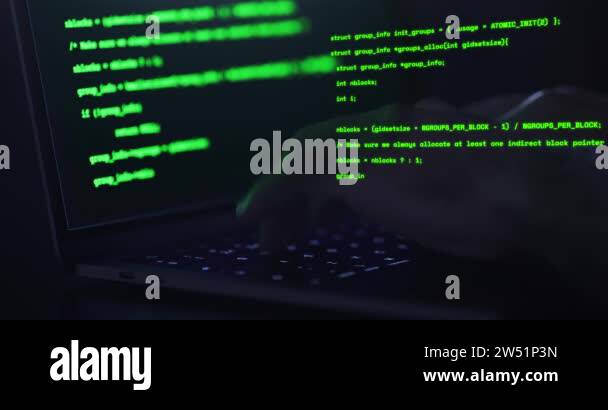 Hacker Hands Typing On A Keyboard Close Up View Man Coding Using A Notebook With Overlayed