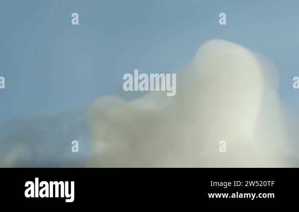 Abstract white steam smoke on a blue background.A cloud of chemical ...