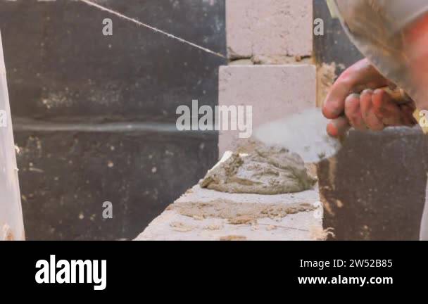 Laying a block Stock Videos & Footage - HD and 4K Video Clips - Alamy