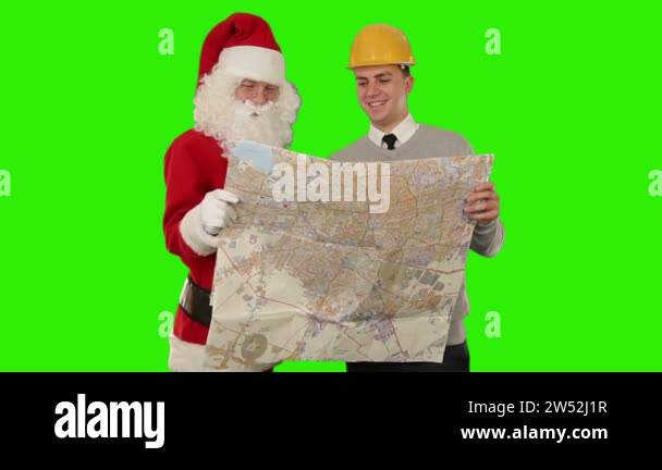 Santa Claus with a Young Architect reading a map, Green Screen Stock ...