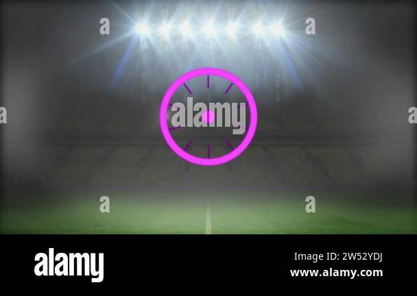 Animation of pink circular scanner moving over floodlit football pitch ...