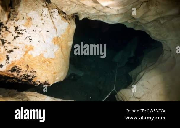 Technical diver in red flippers in the underwater cave of Budapest Stock Video Footage - Alamy