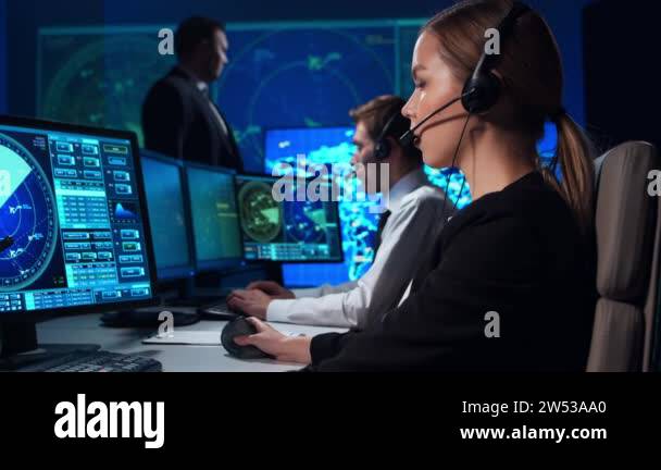 Workplace of the air traffic controllers in the control tower. Team of ...