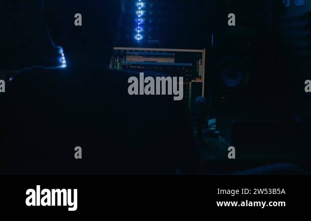 Recording studio. Sound engineer working at the computer monitor ...