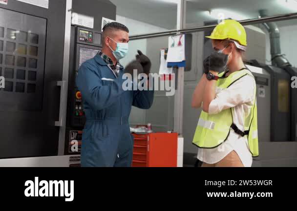worker Labor man and woman and wearing protection mask face and safety ...