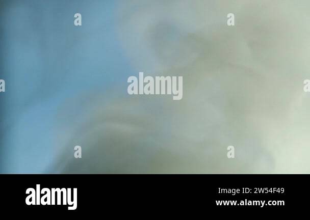 Abstract white steam smoke on a blue background.A cloud of chemical ...