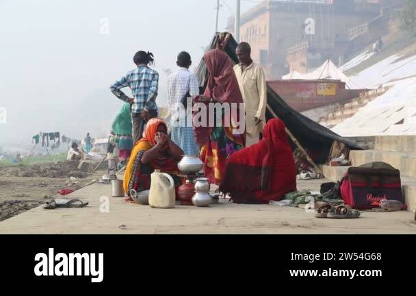 people at ghats of the Ganges river in India Stock Video Footage - Alamy