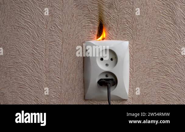 Plug socket fire Stock Videos & Footage - HD and 4K Video Clips - Alamy