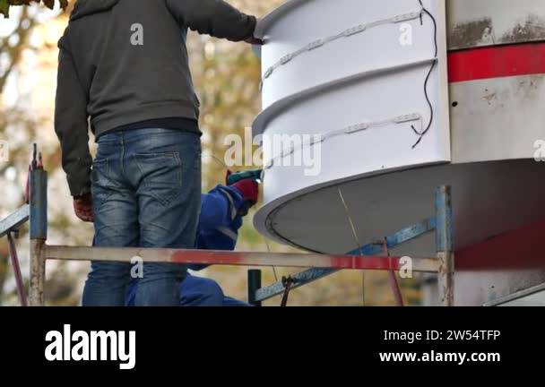 Install signage Stock Videos & Footage - HD and 4K Video Clips - Alamy