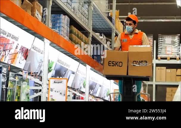 Unloading the cargo in the warehouse. Console warehouse lift Stock ...