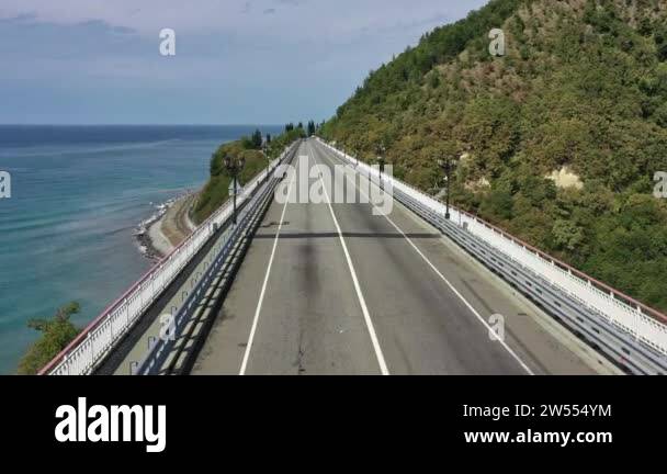 Beautiful large bridge across sea, aerial view of drone slide turn ...